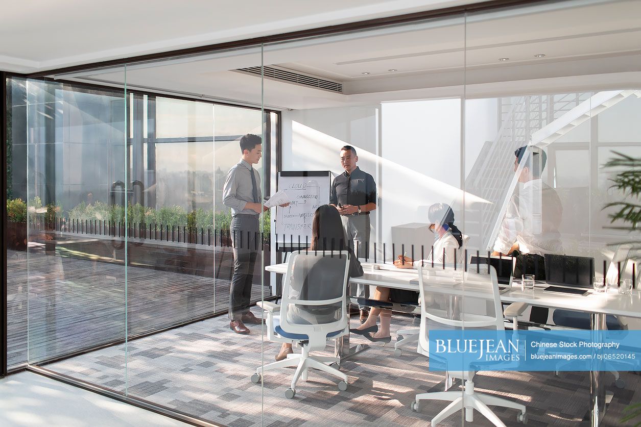 Chinese business people having meeting in board room-High-res stock ...