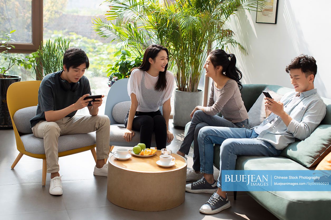 Happy Chinese friends having fun together-High-res stock photo for download