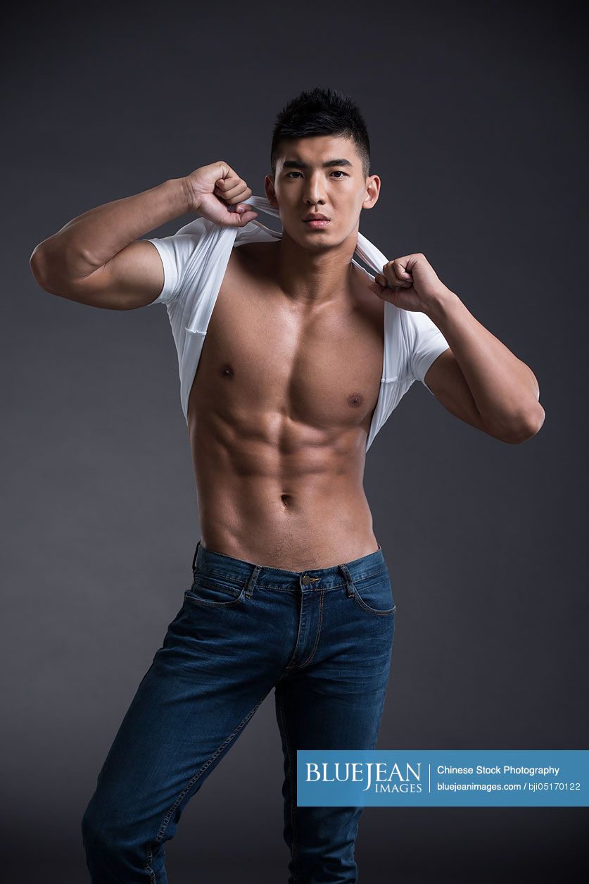 Portrait of young Chinese muscular man-High-res stock photo for download