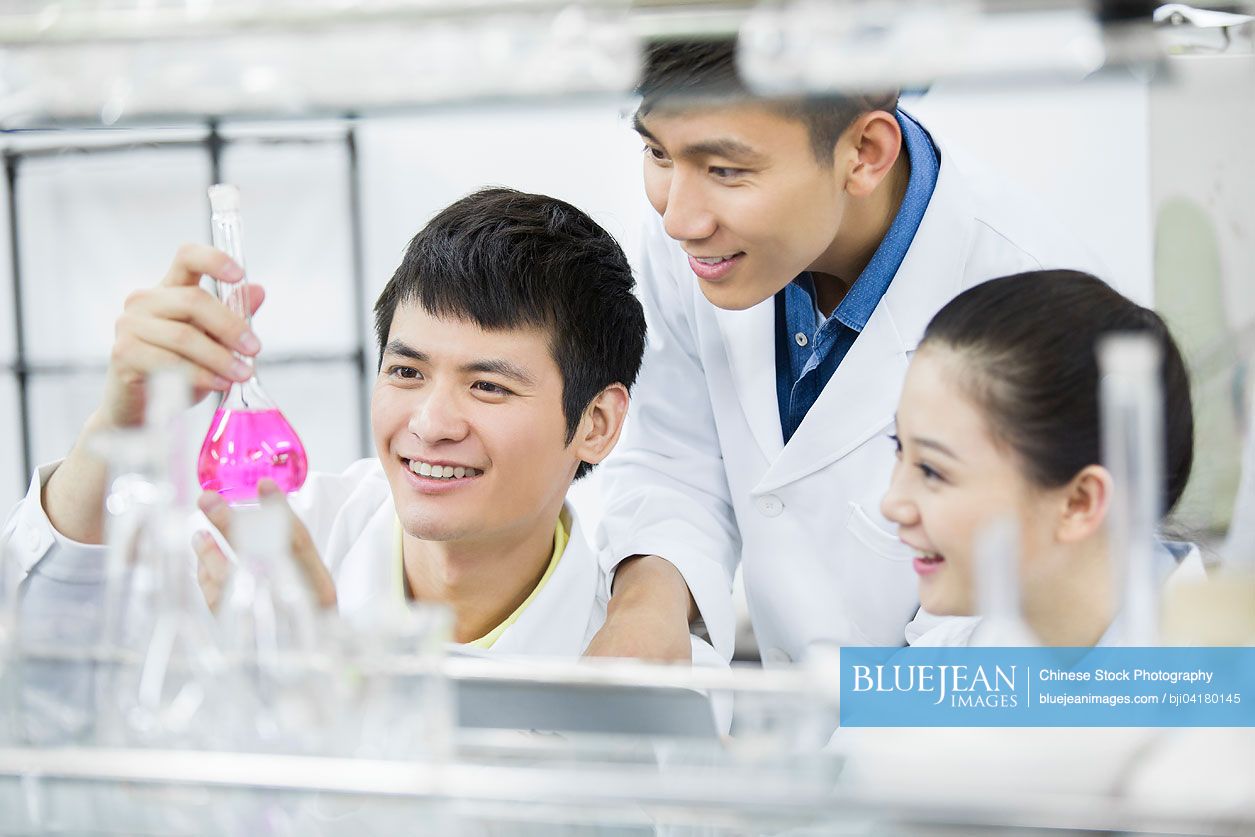 Chinese college students doing experiment-High-res stock photo for download