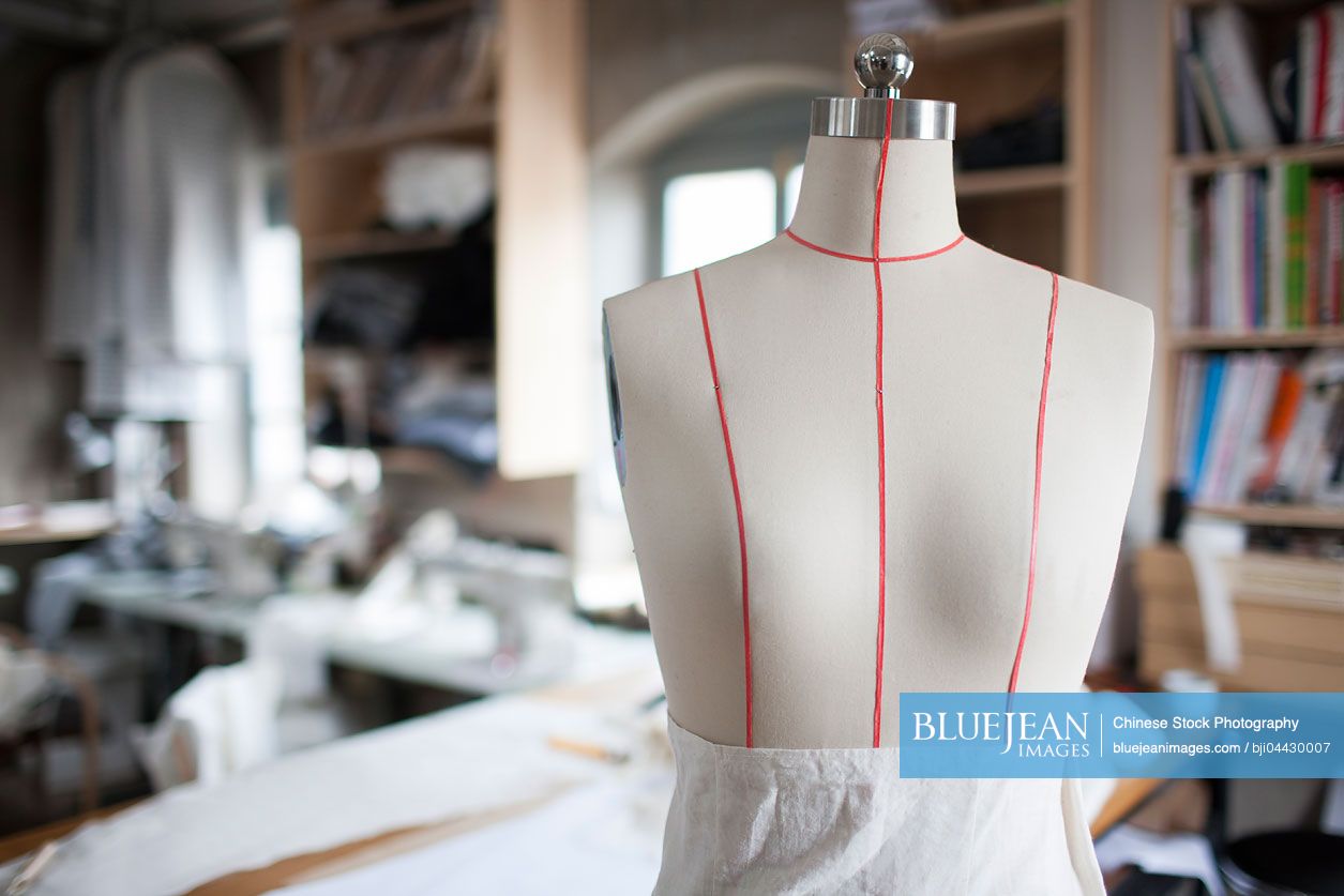 A dressmaker's model in clothing design studio-High-res stock photo for ...