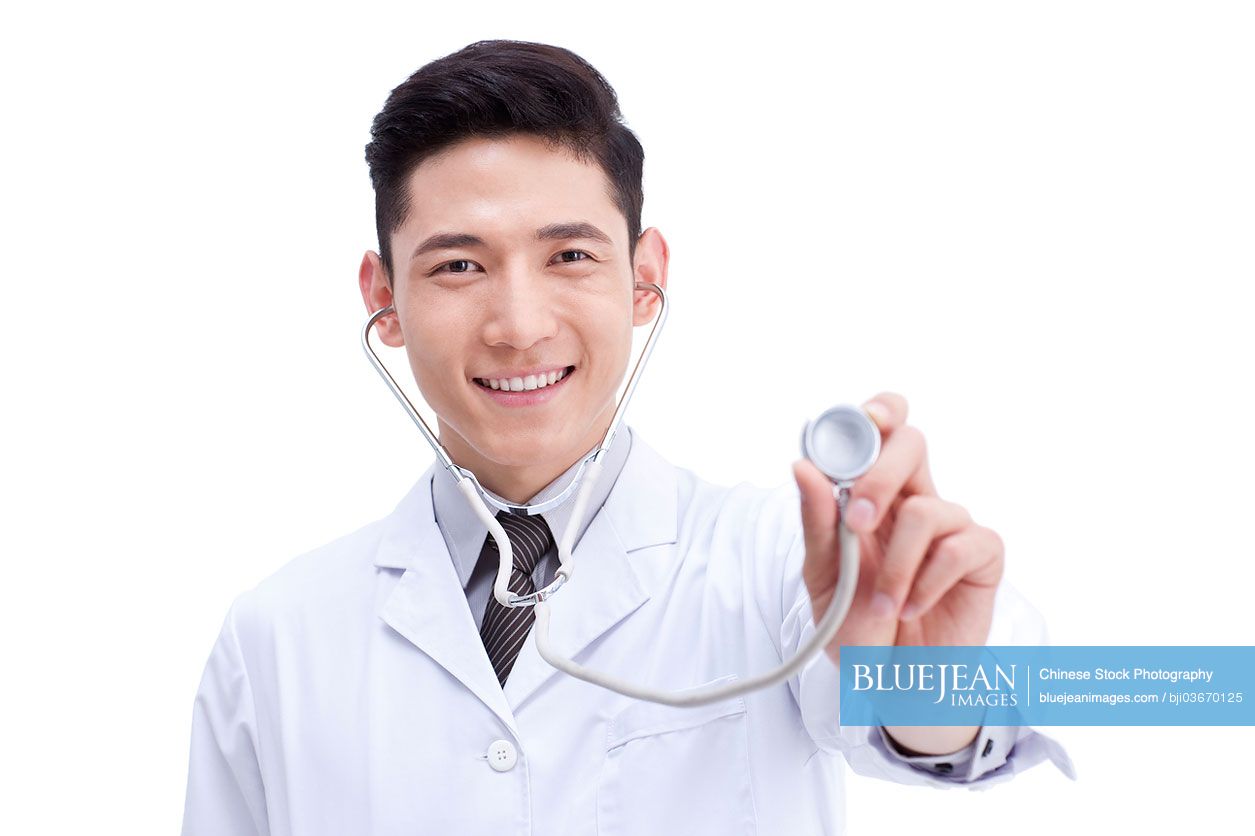 Male Chinese doctor with stethoscope-High-res stock photo for download