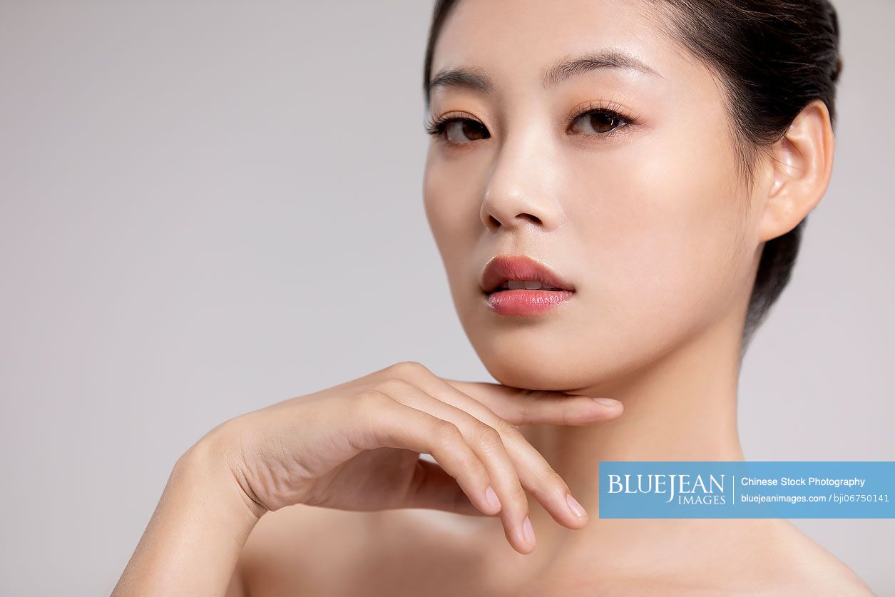 Studio shot of beautiful young Chinese woman-High-res stock photo for download