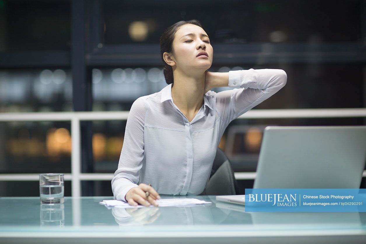 Young Chinese businesswoman working in office-High-res stock photo for ...