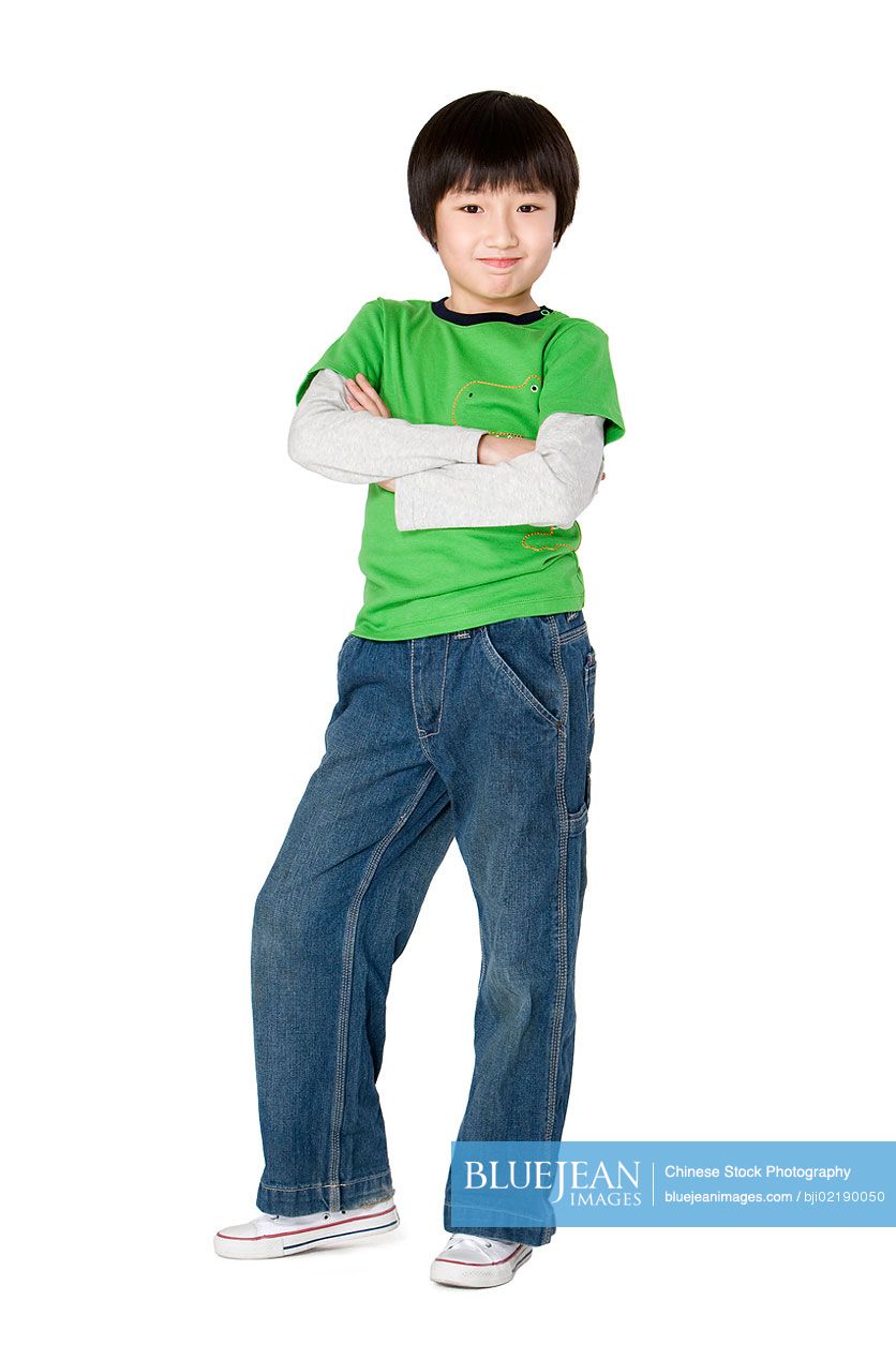 Young Chinese boy standing with arms crossed-High-res stock photo for ...