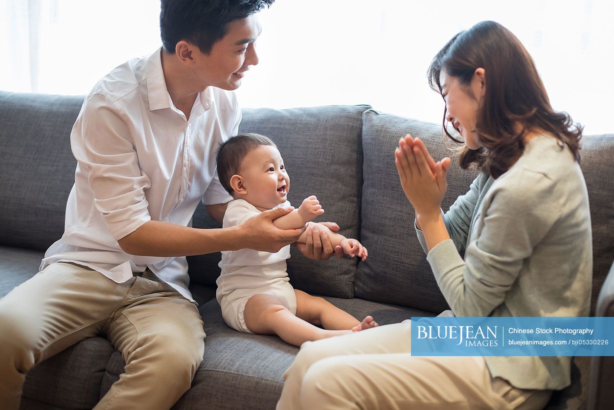 Happy young Chinese family-High-res stock photo for download