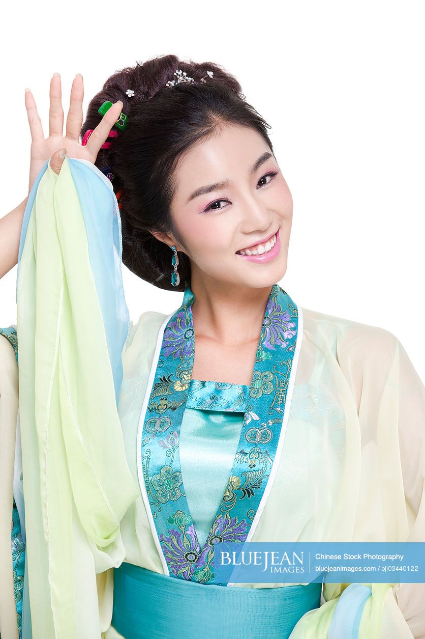Young Chinese woman in Chinese traditional costume gesturing-High-res ...