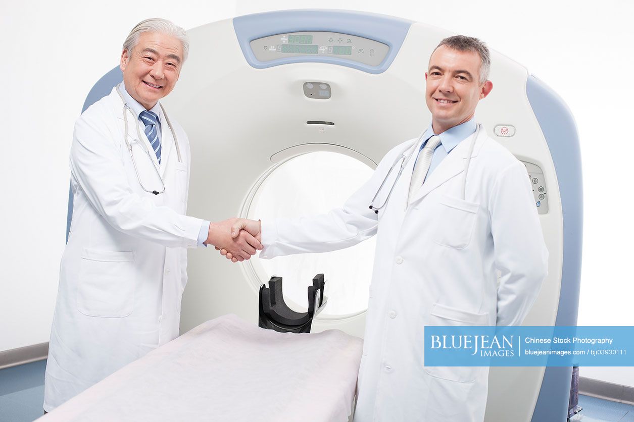 Doctors in CT room-High-res stock photo for download