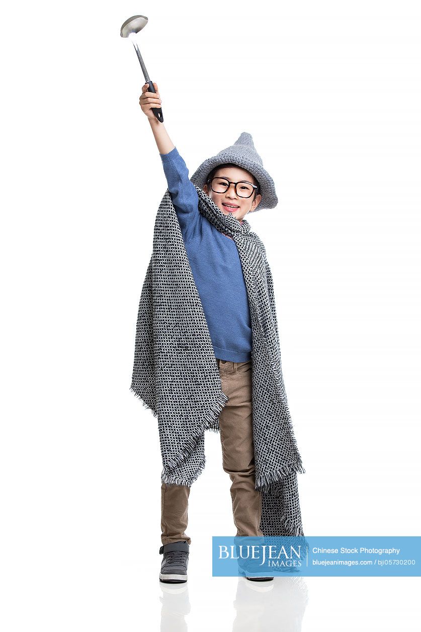 Happy little Chinese boy in wizard costume-High-res stock photo for ...