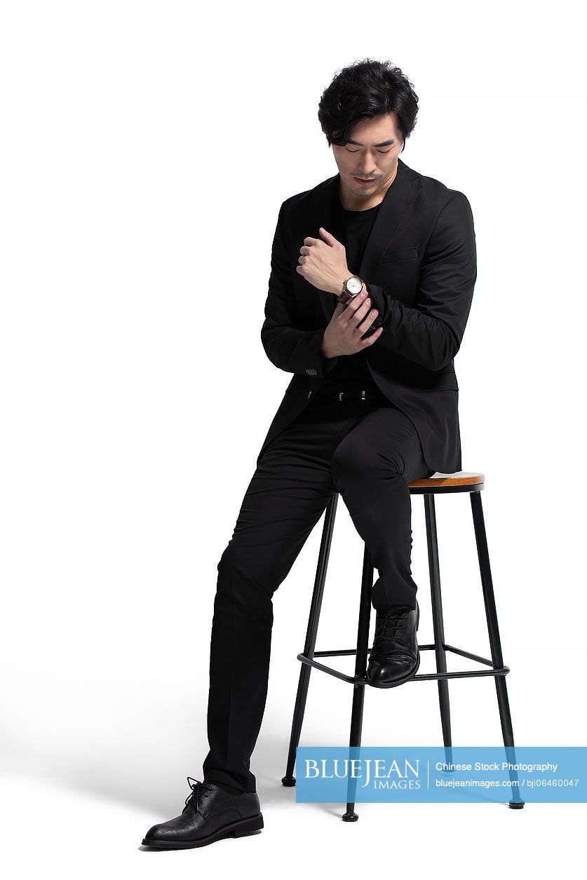 Studio shot of fashionable mid adult Chinese man-High-res stock photo ...