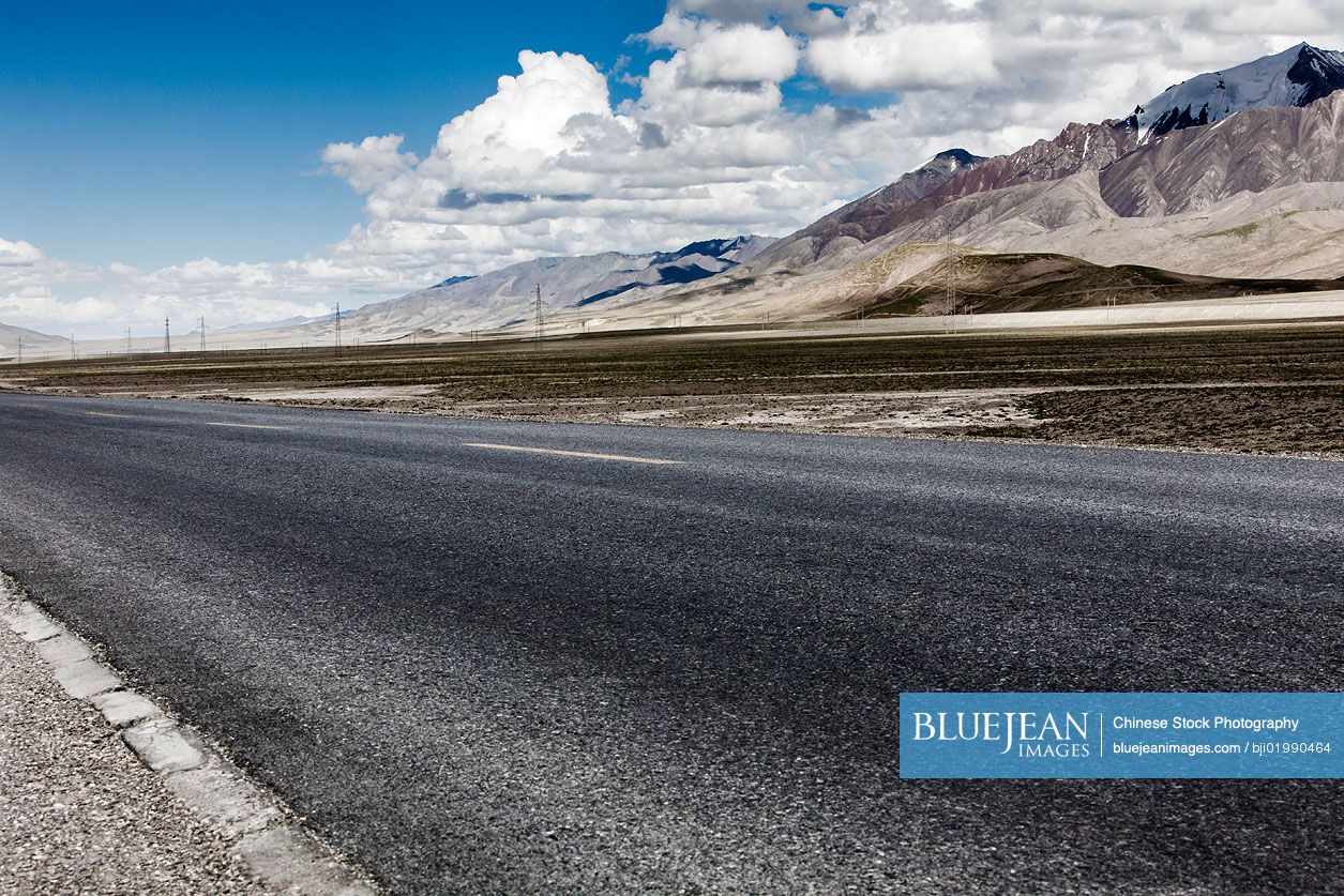Road going through the mountains, Qinghai Province-High-res stock photo ...
