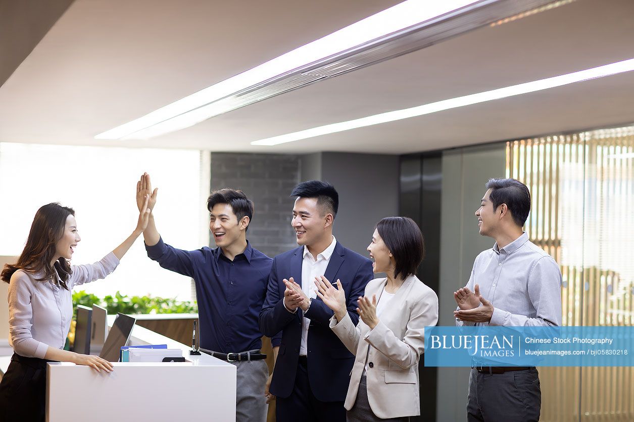 Chinese business people applauding in the office-High-res stock photo ...