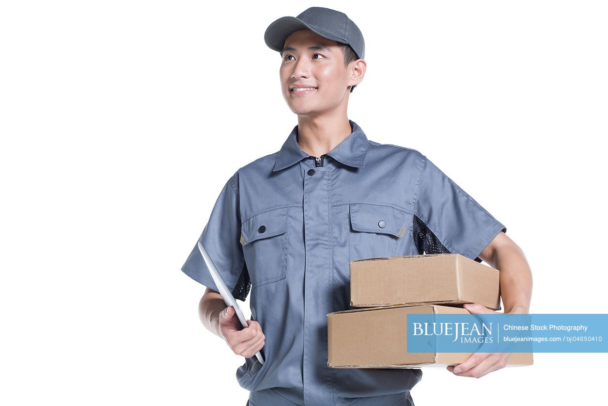 Chinese delivery person delivering package-High-res stock photo for ...