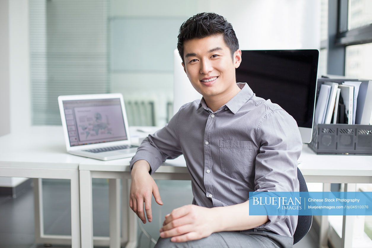 Portrait of young Chinese businessman-High-res stock photo for download