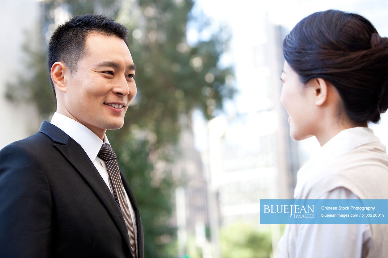 Chinese business coworkers smiling face to face-High-res stock photo ...