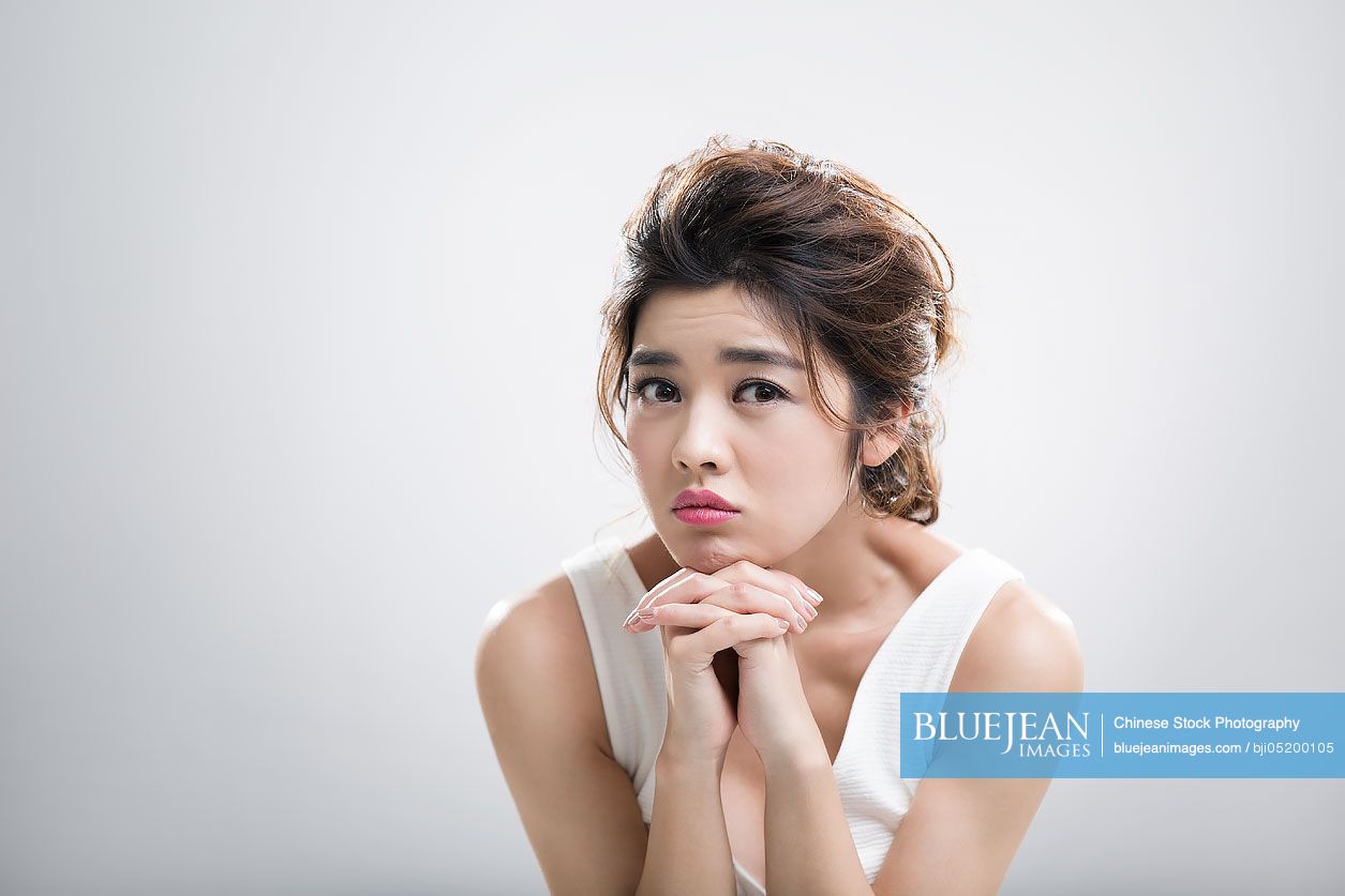 Portrait of cute young Chinese woman-High-res stock photo for download