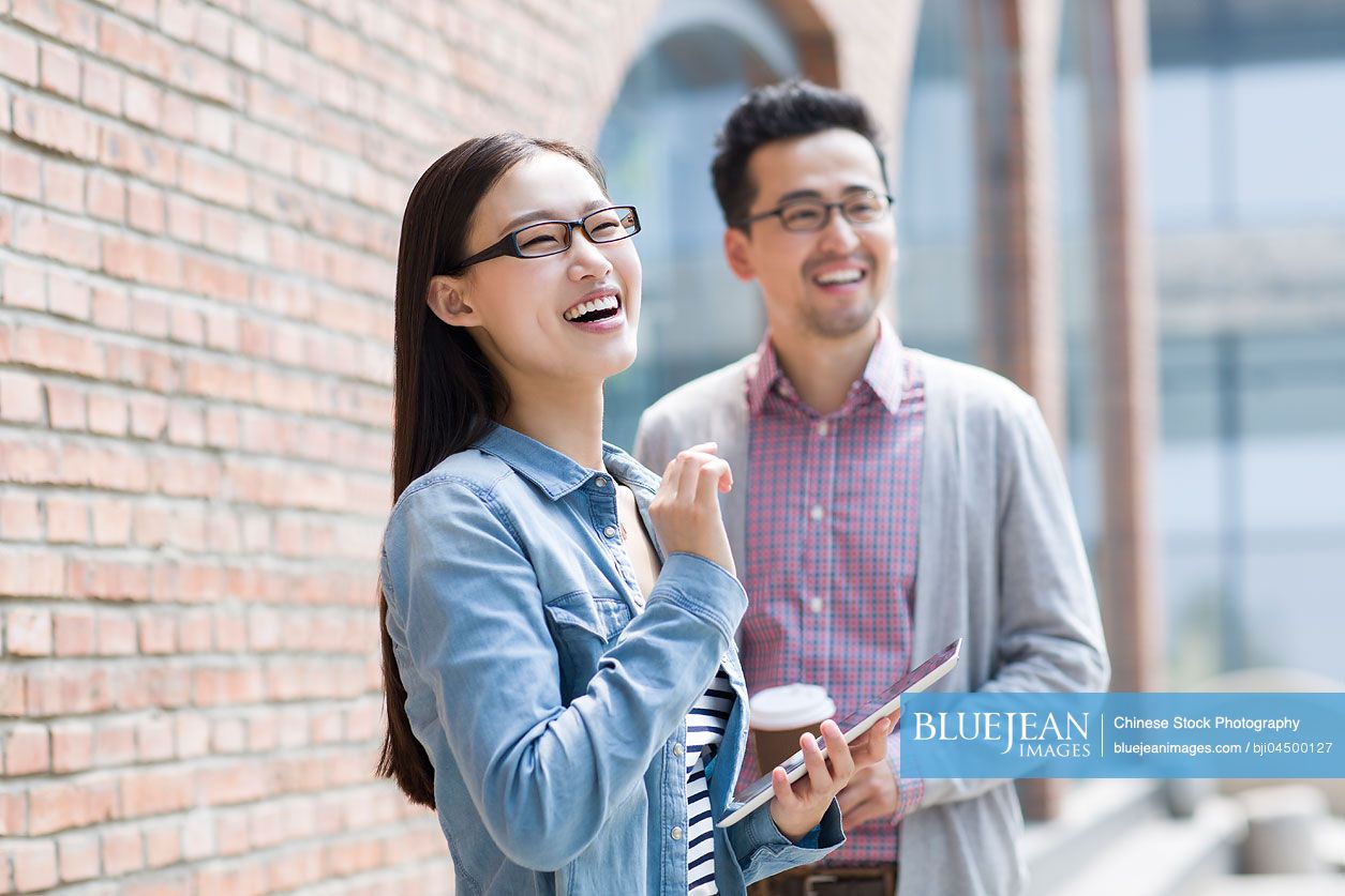 Happy Chinese business partners in cultural industry-High-res stock ...