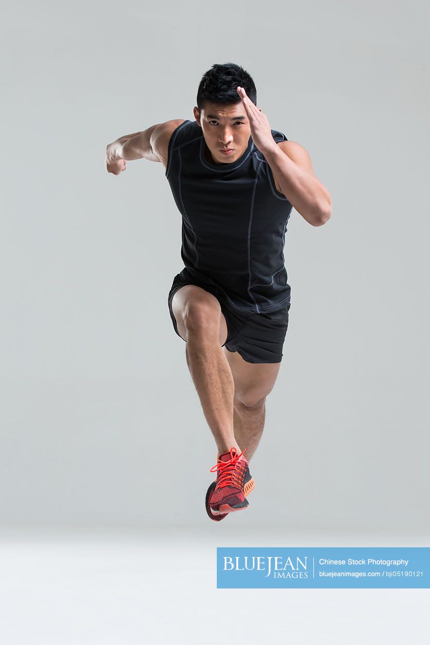 Male Chinese athlete running-High-res stock photo for download