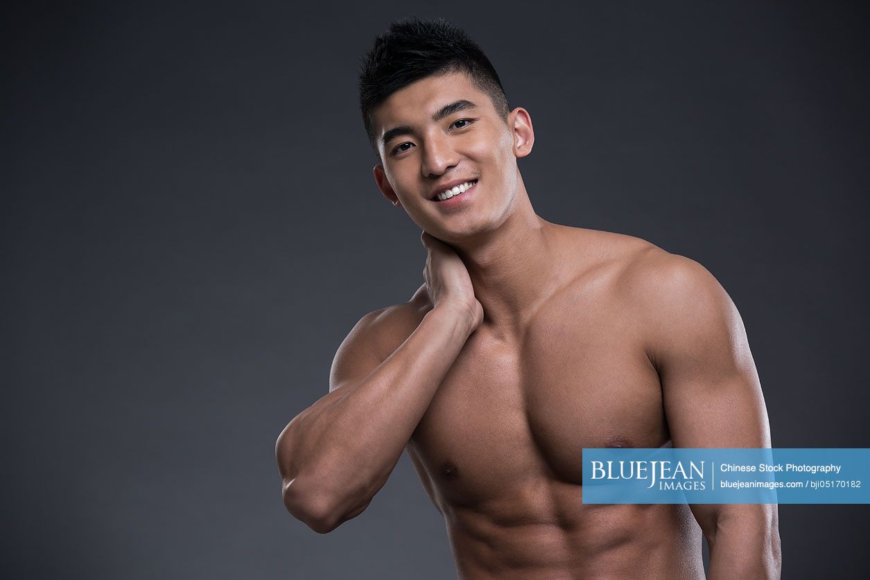 Portrait of young Chinese muscular man-High-res stock photo for download