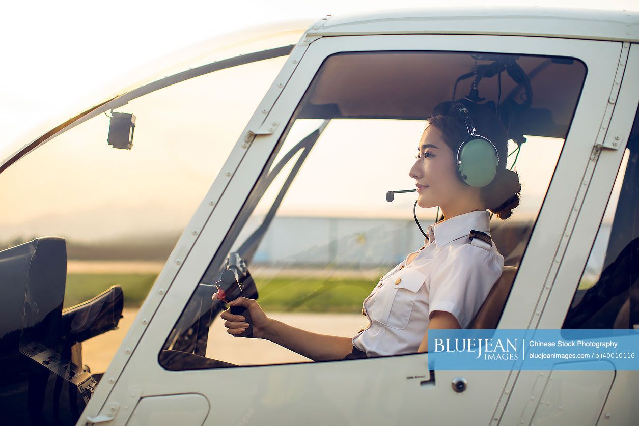 Chinese pilot sitting in helicopter cockpit-High-res stock photo for ...