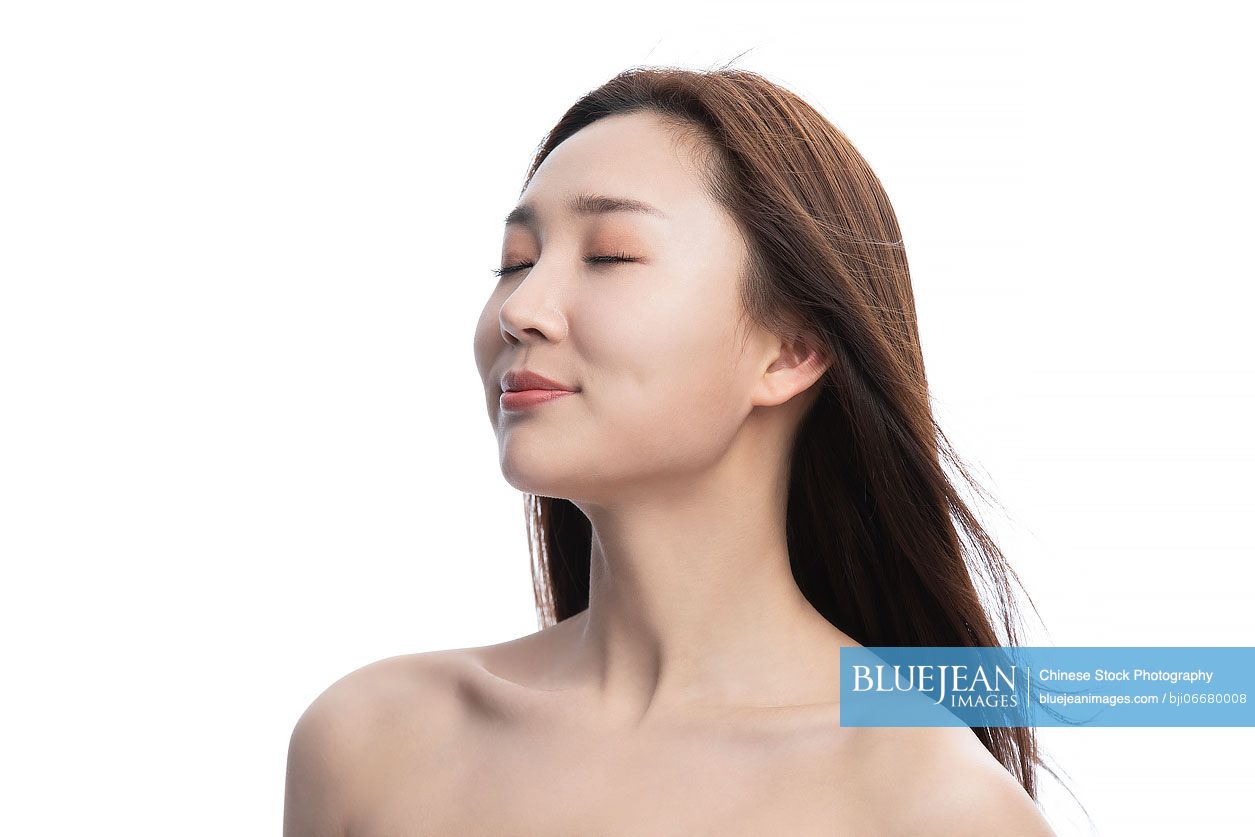 Beautiful young Chinese woman with long hair-High-res stock photo for download