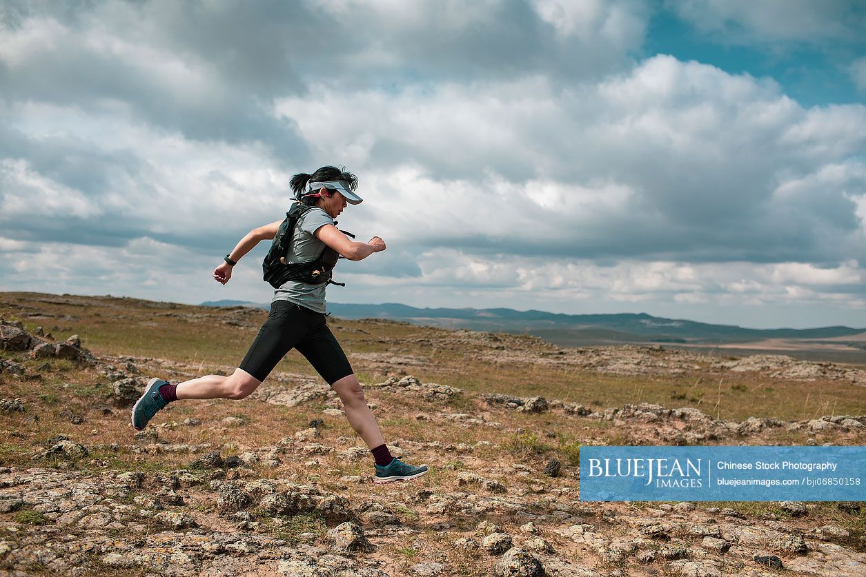 Chinese female trail runner training in nature-High-res stock photo for ...