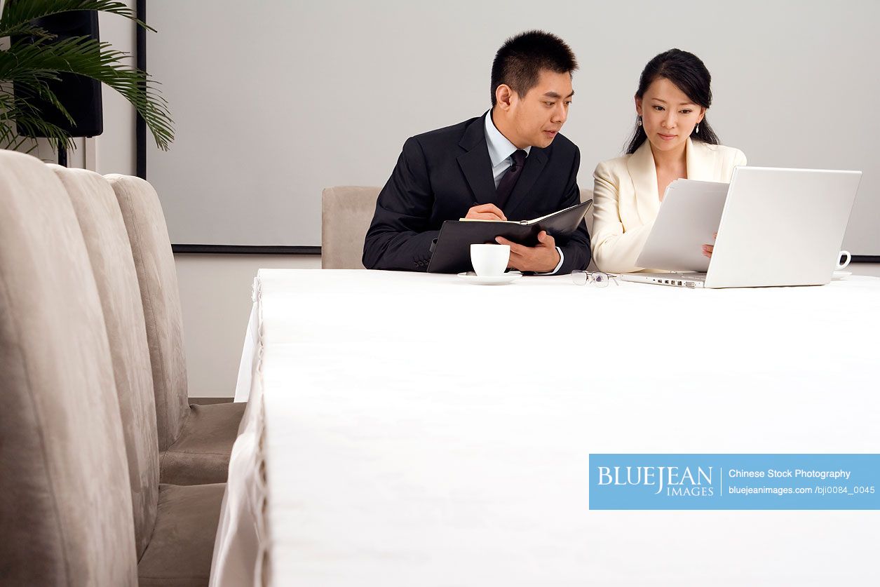 Chinese businesspeople during working lunch-High-res stock photo for ...