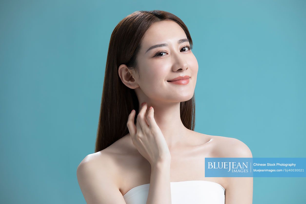 Studio shot of beautiful young Chinese woman-High-res stock photo for download