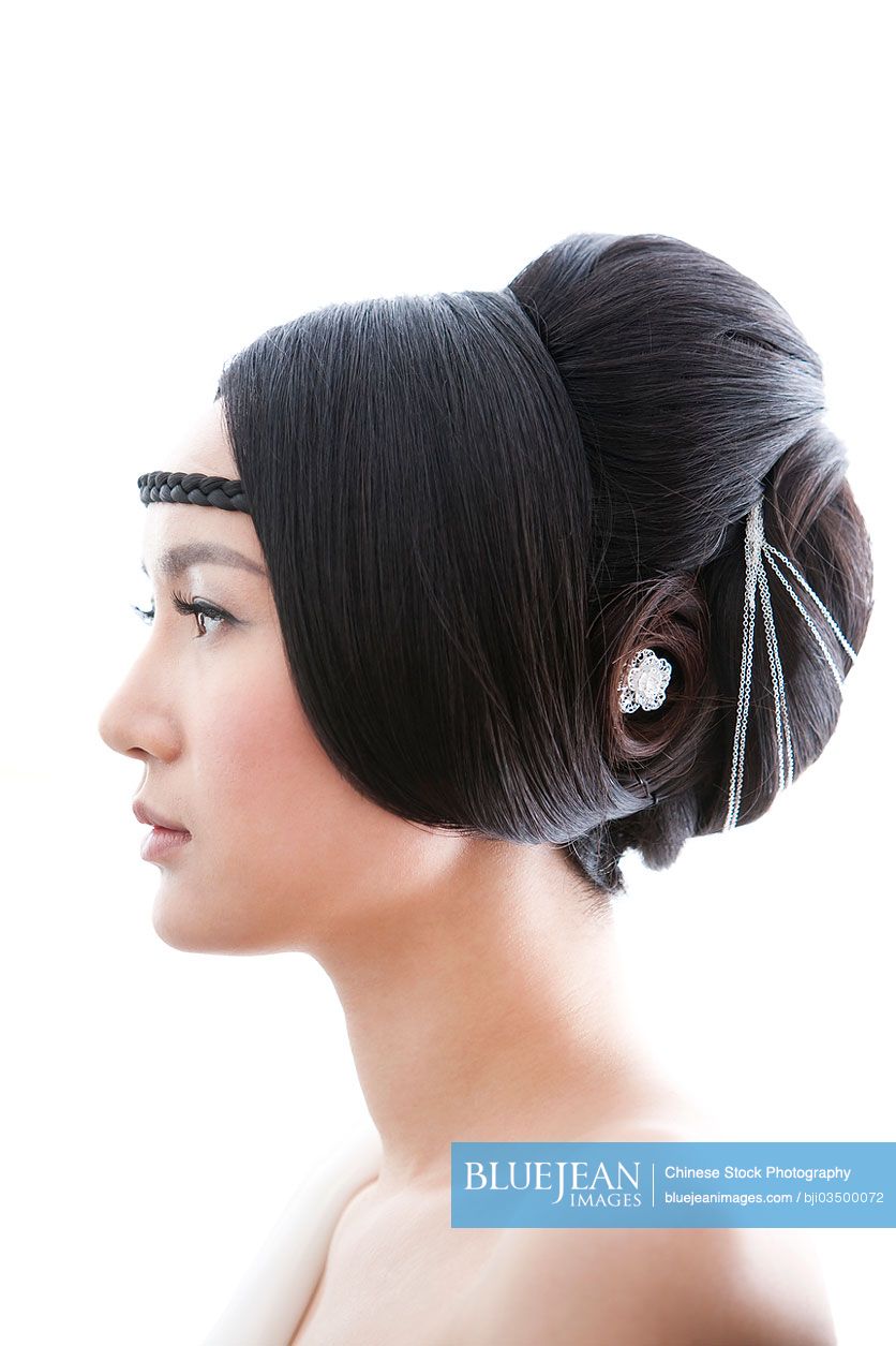 Beautiful young Chinese woman with Chinese traditional hairstyle-High-res stock photo for download