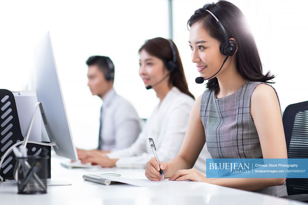 Professional Chinese customer service staff in office-High-res stock ...