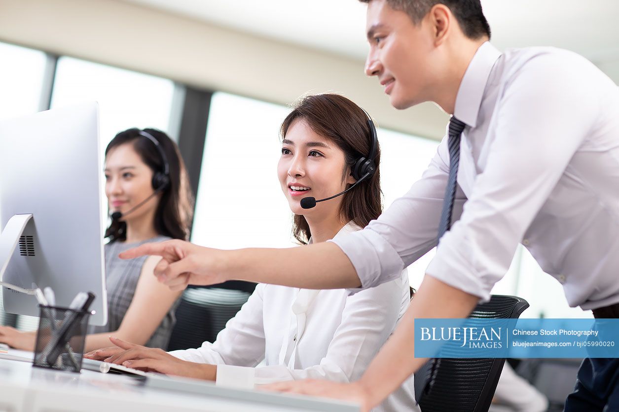 Chinese call center agents working in office-High-res stock photo for ...