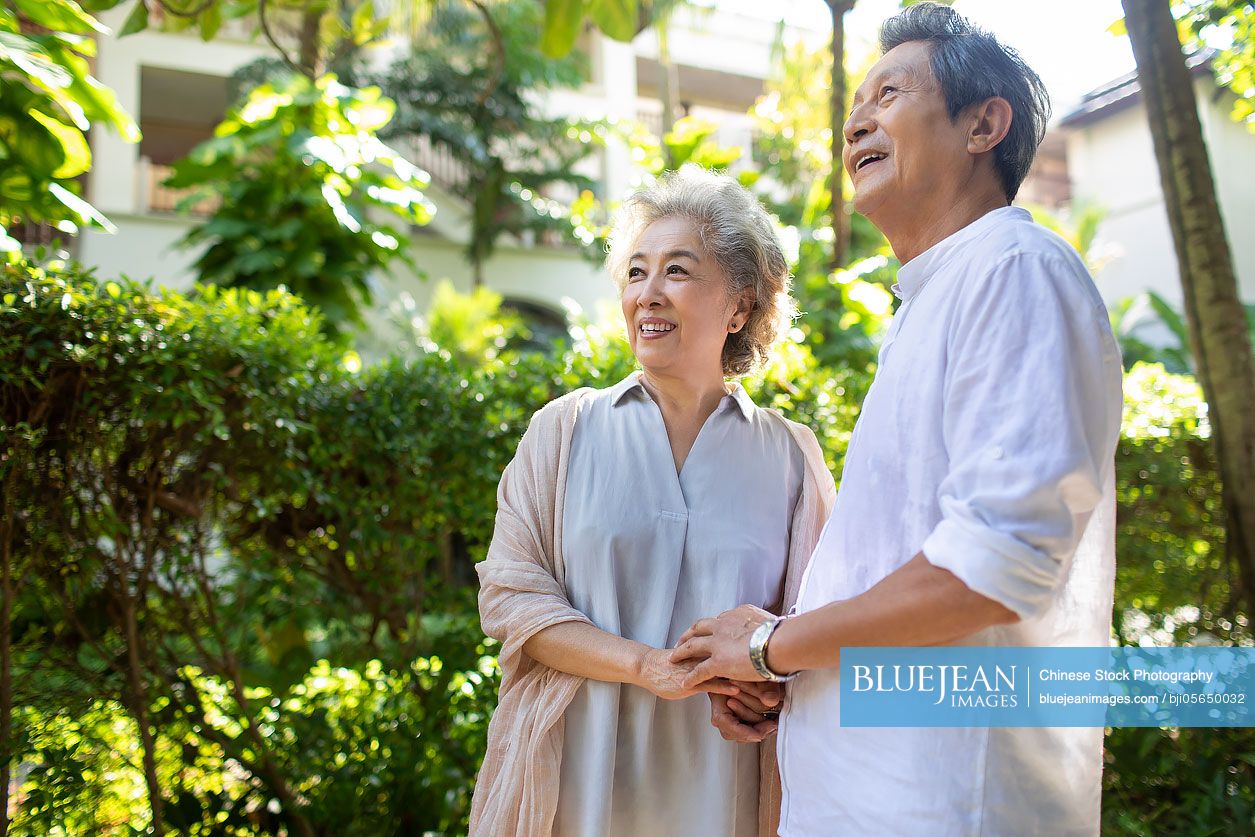 Happy senior Chinese couple on vacation-High-res stock photo for download