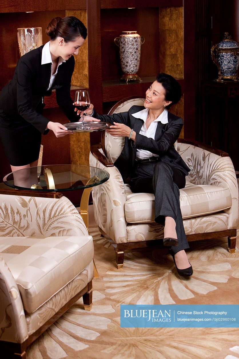 Professional service in club house-High-res stock photo for download