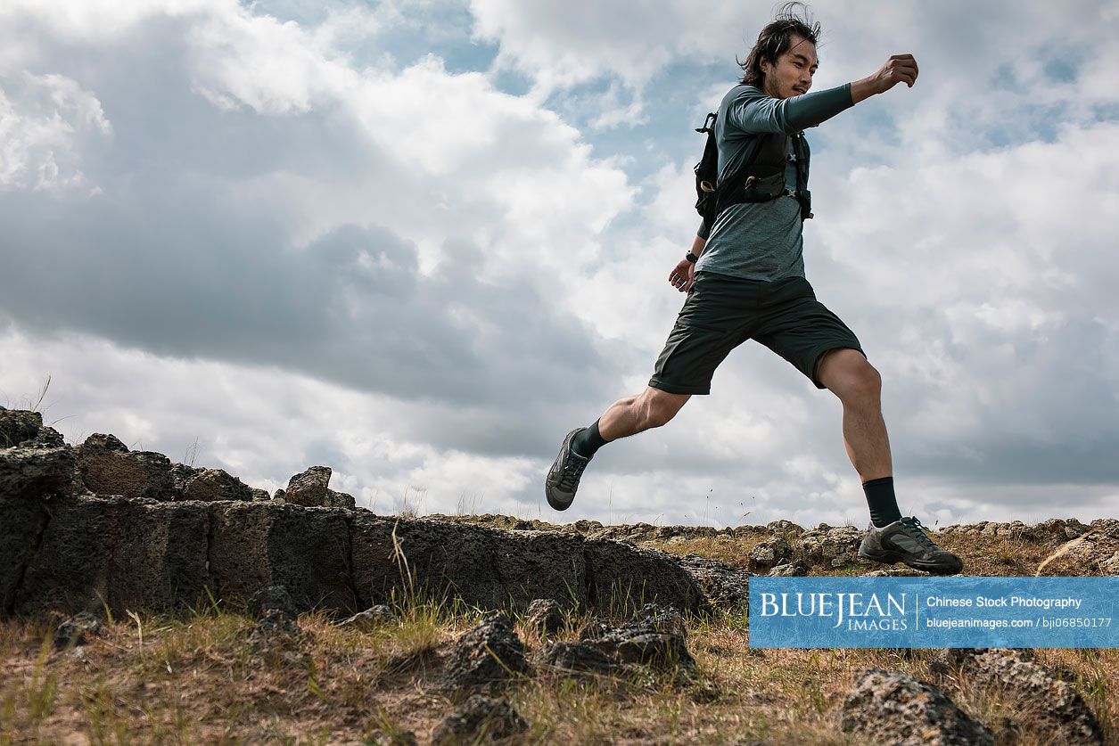 Chinese male trail runner training in nature-High-res stock photo for ...