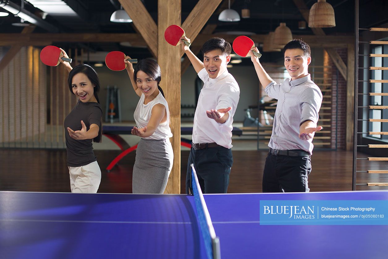 Young Chinese business person playing ping pong-High-res stock photo ...