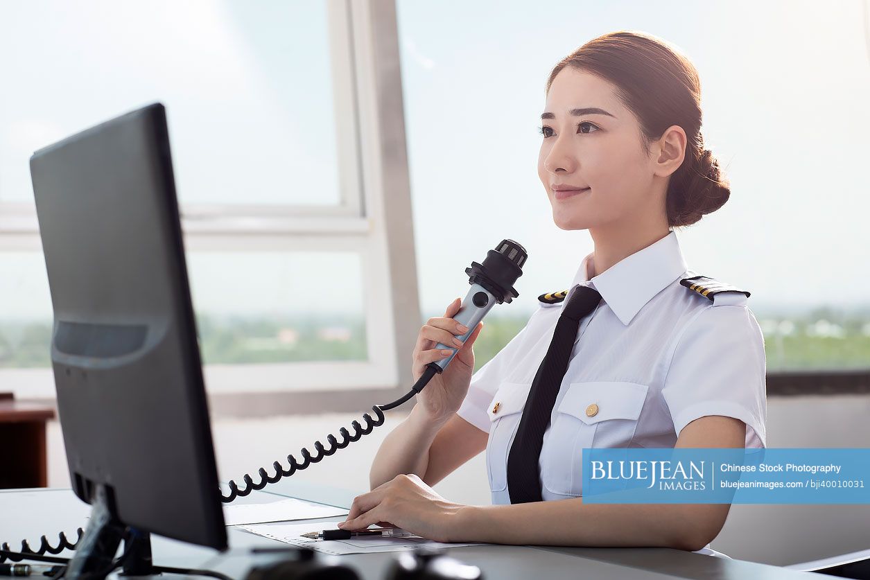 Chinese air traffic controller in tower-High-res stock photo for download