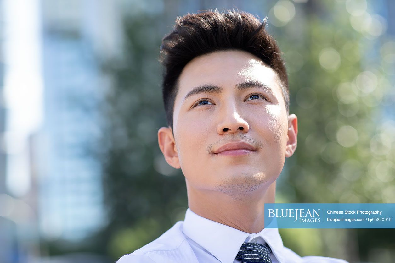 Confident young Chinese businessman-High-res stock photo for download
