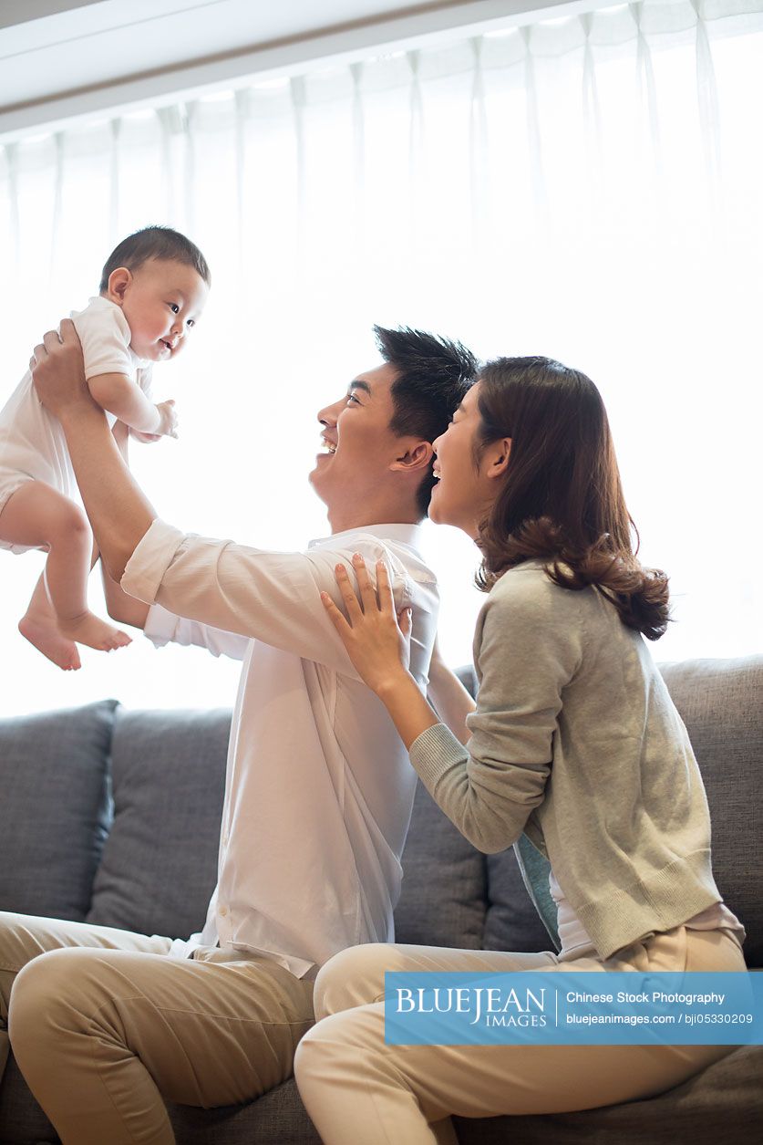 Happy young Chinese family-High-res stock photo for download
