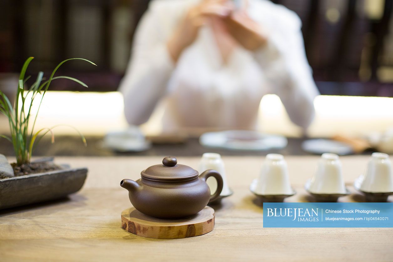 Mid adult Chinese woman performing tea ceremony-High-res stock photo ...