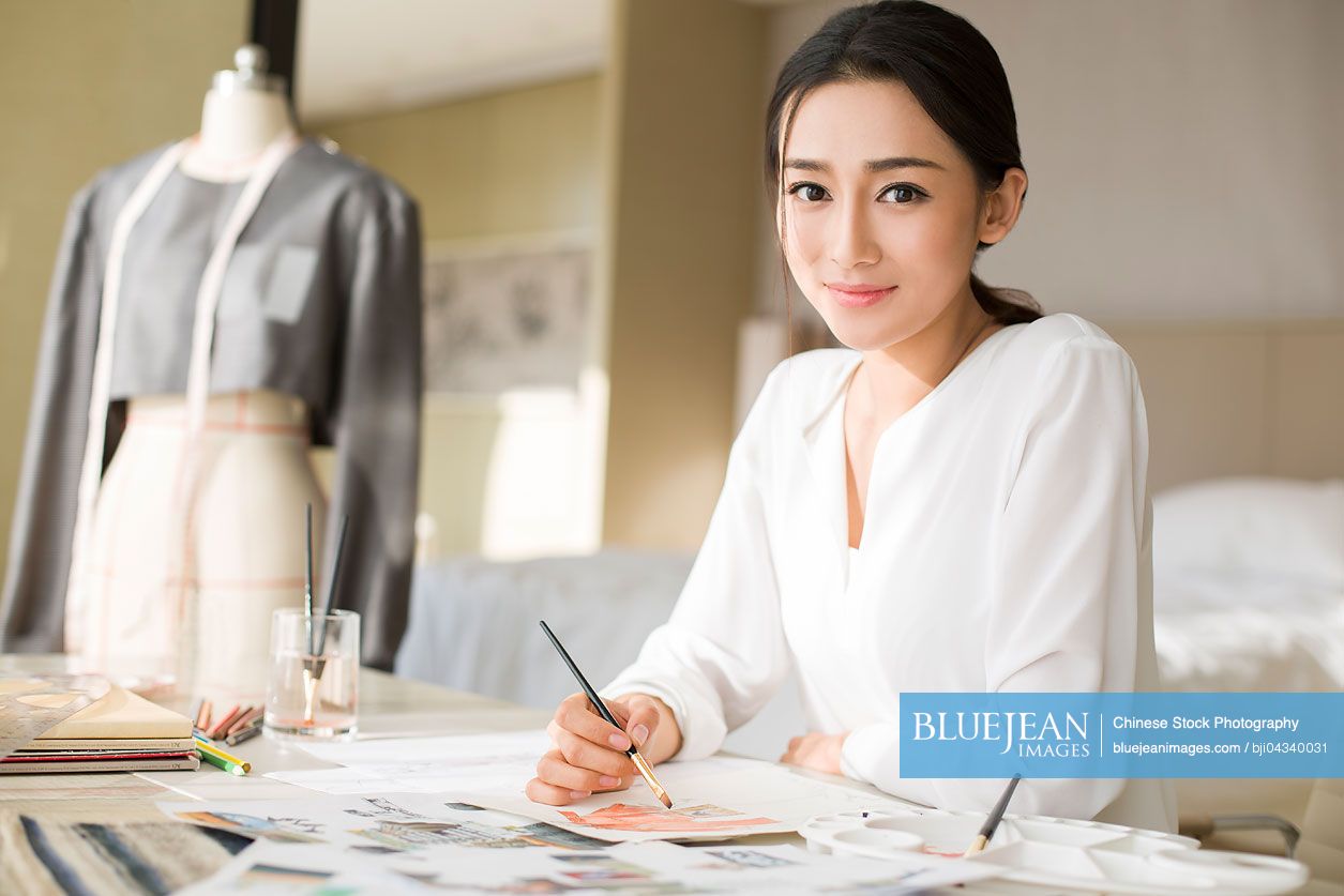 Chinese fashion designer drawing sketch-High-res stock photo for download