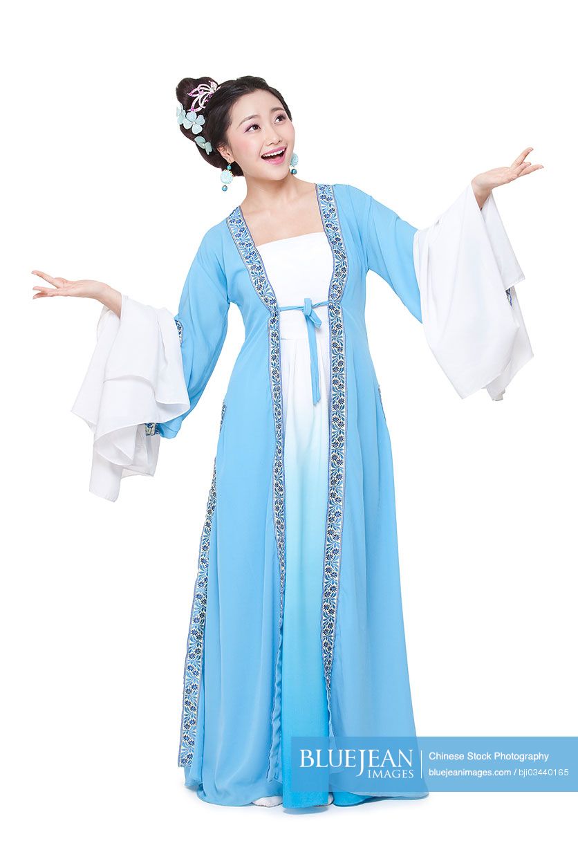 Young Chinese woman in Chinese traditional costume gesturing-High-res ...