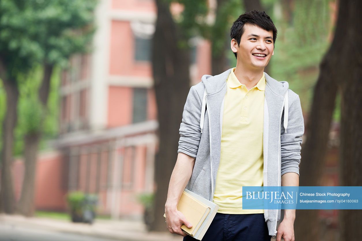 Male Chinese college student on campus-High-res stock photo for download