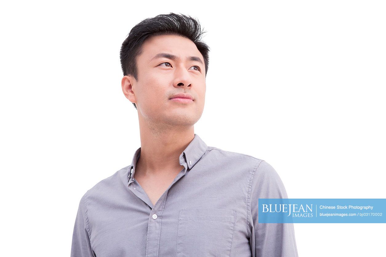 Portrait of young Chinese man looking at view-High-res stock photo for ...