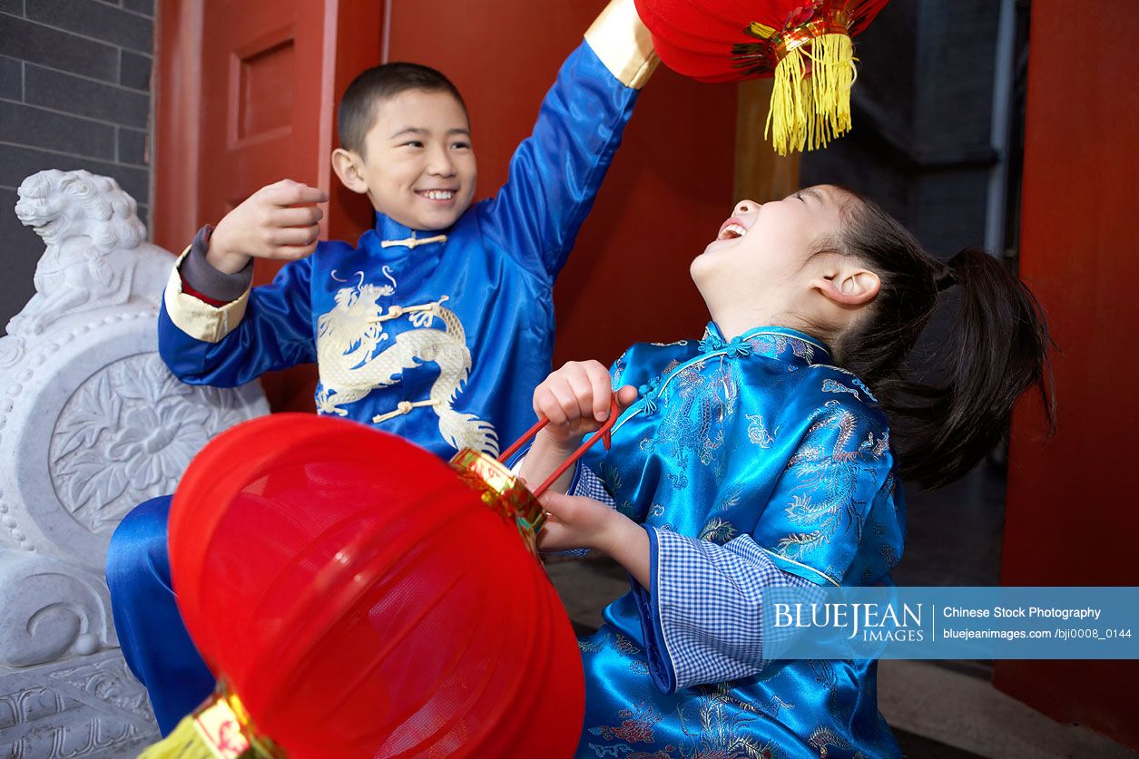 Chinese children playing with lanterns at Chinese New Year-High-res ...