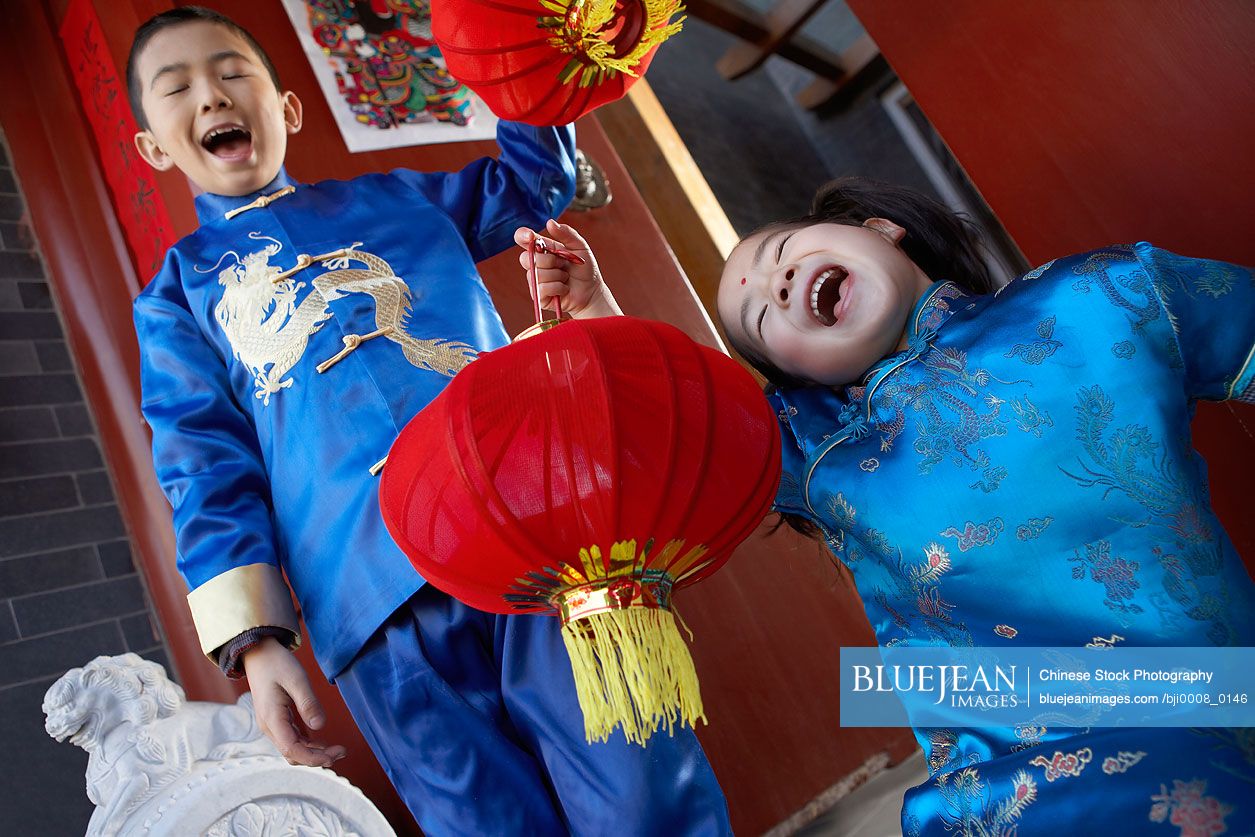 Chinese children playing with lanterns at Chinese New Year-High-res ...