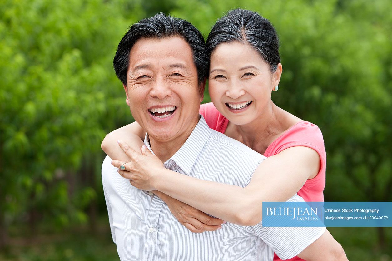 Happy senior Chinese couple in a park-High-res stock photo for download