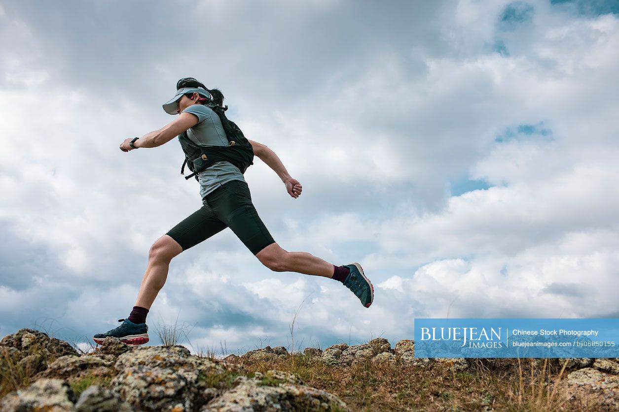 Chinese female trail runner training in nature-High-res stock photo for ...