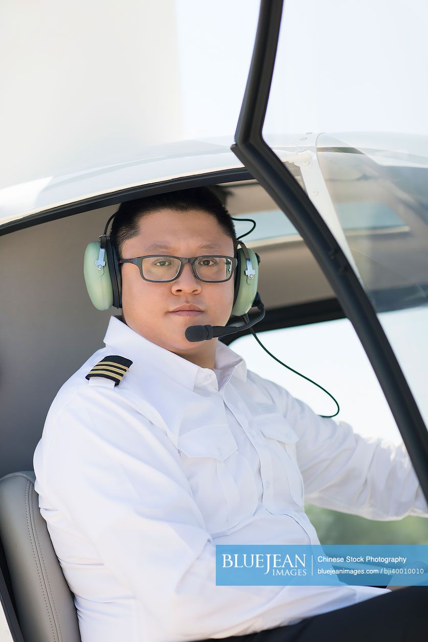 Close-up of Chinese pilot in helicopter cockpit-High-res stock photo ...