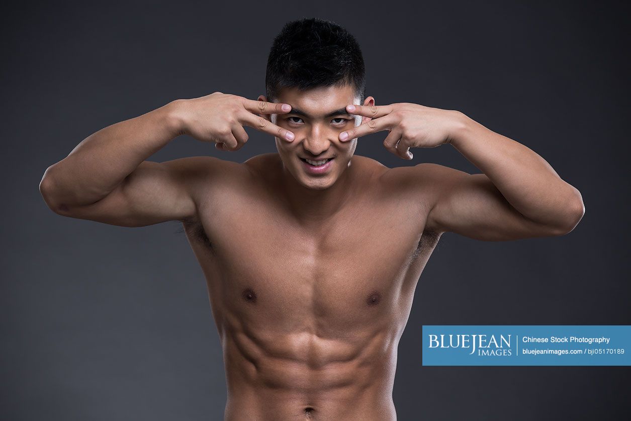 Portrait of young Chinese muscular man-High-res stock photo for download