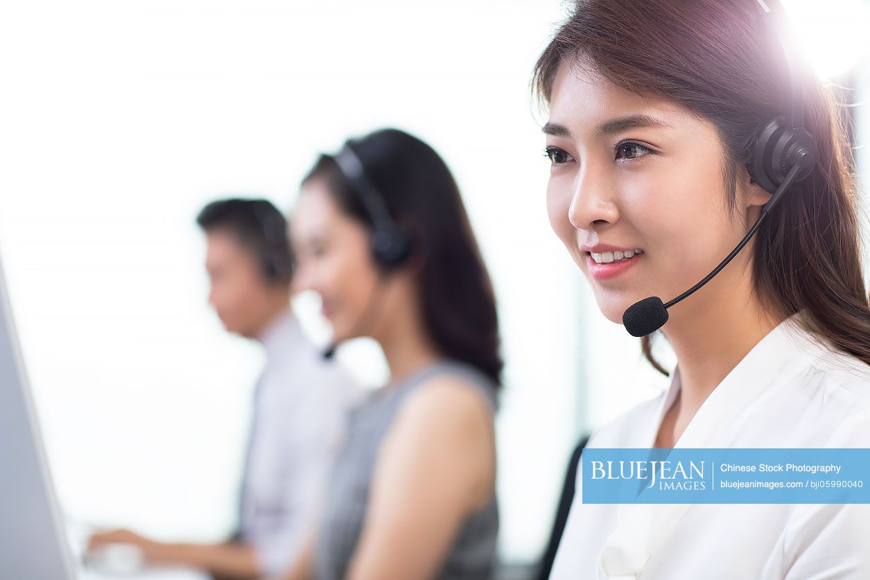 Professional Chinese customer service staff in office-High-res stock ...